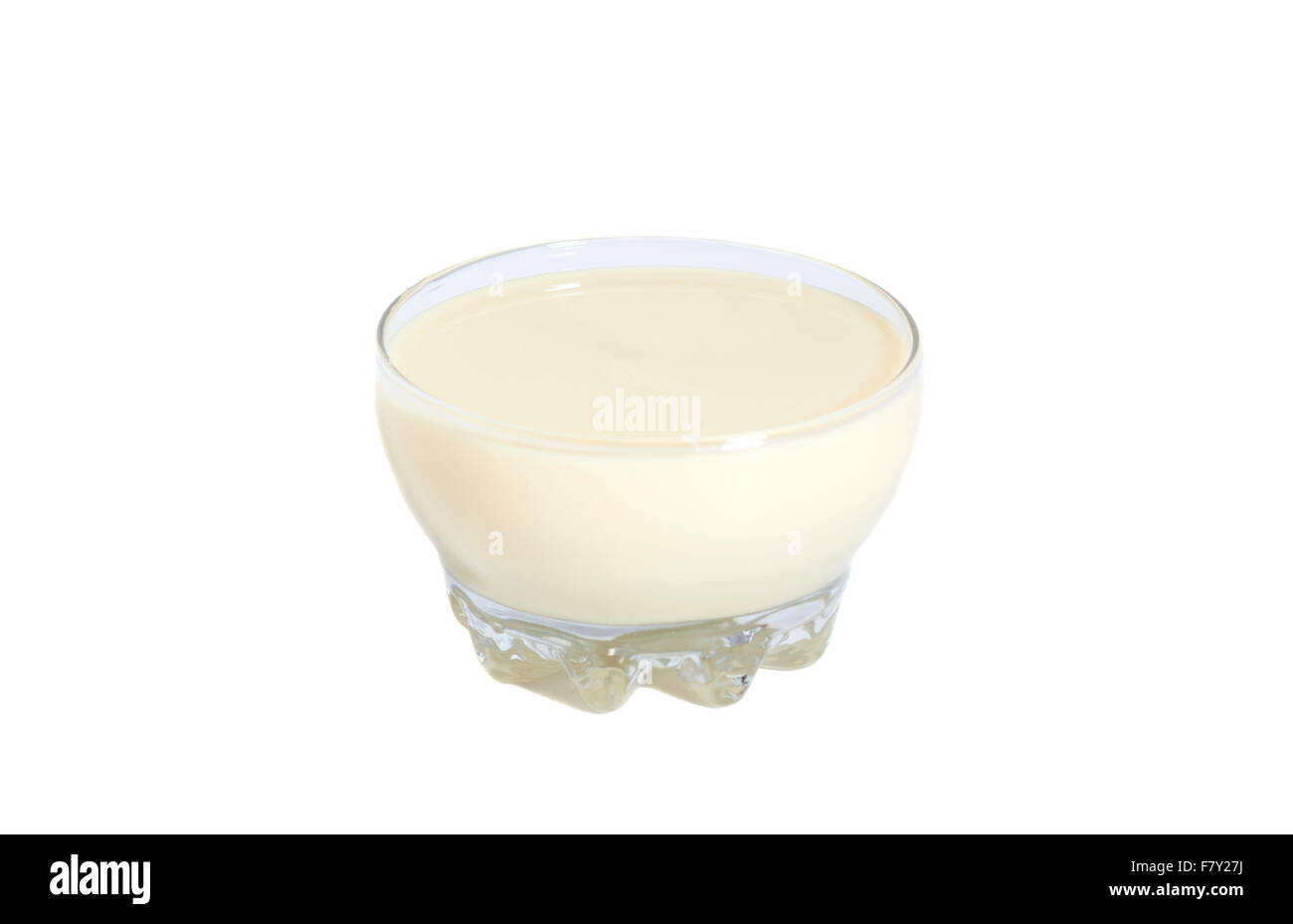 condensed milk with sugar in glass bowl isolated on white Stock Photo ...