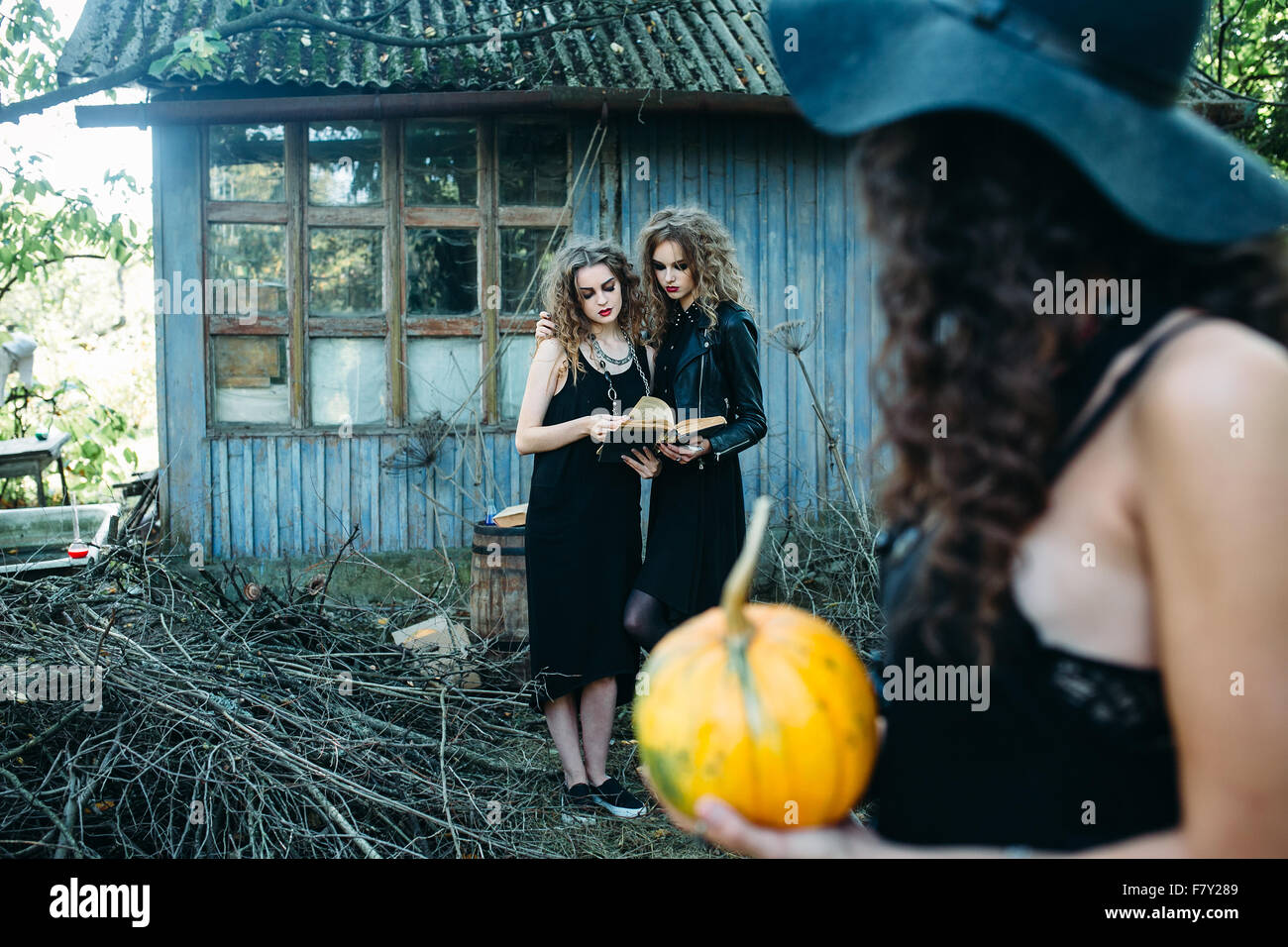 three vintage women as witches Stock Photo - Alamy