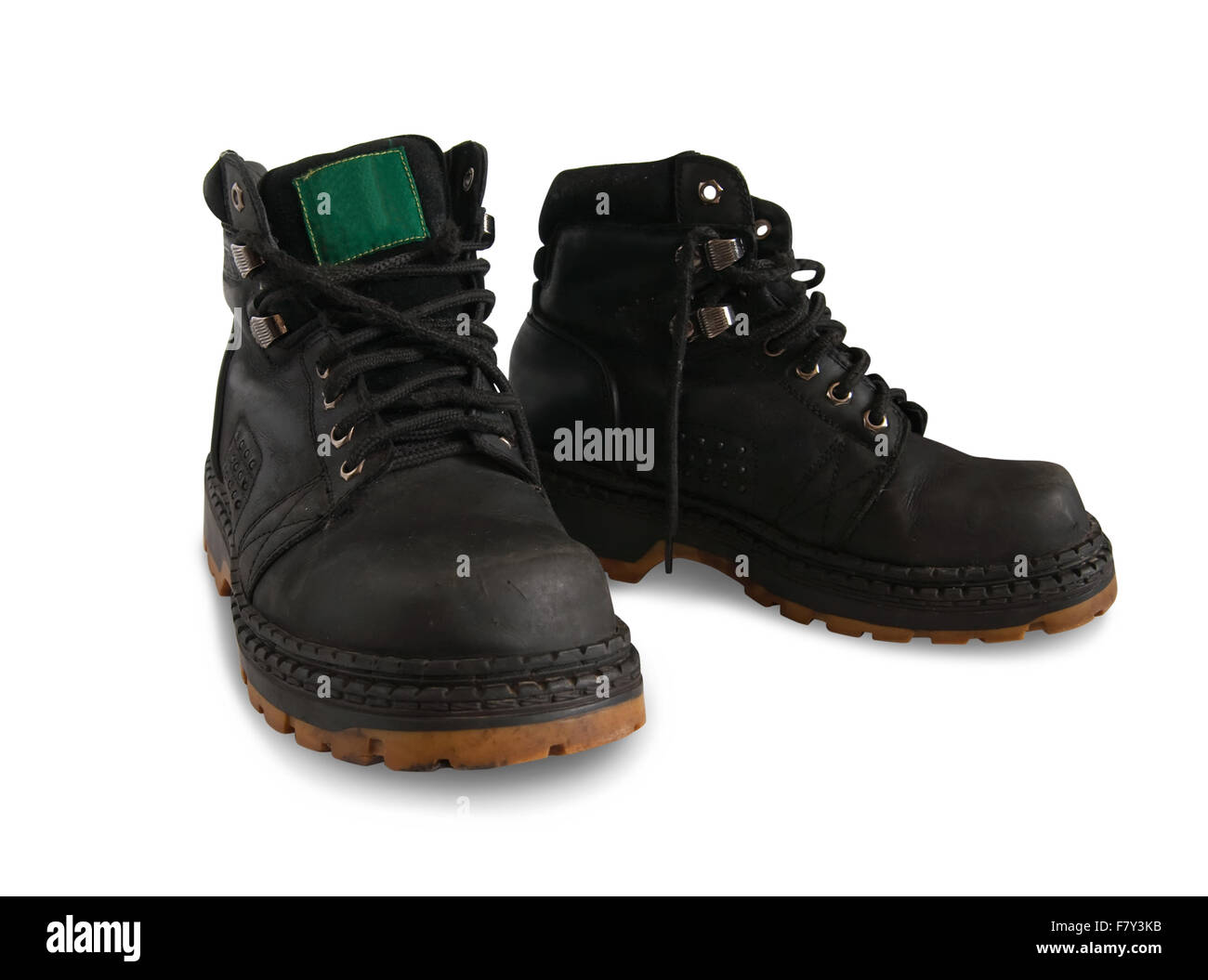 Old black boots, isolated with clipping path Stock Photo - Alamy