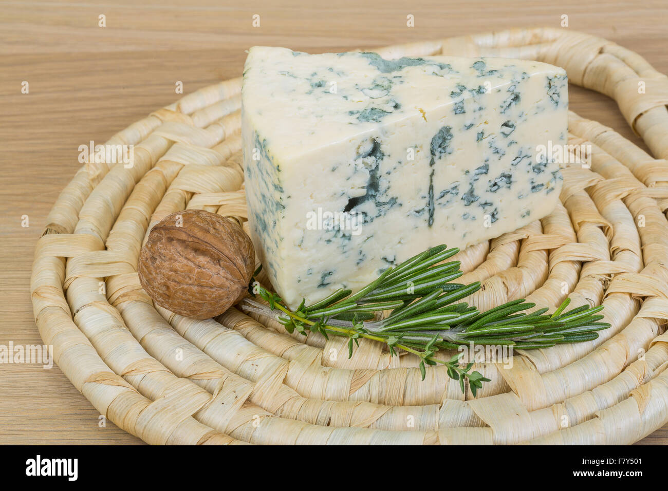 Blue cheese with mold on the wood background Stock Photo - Alamy