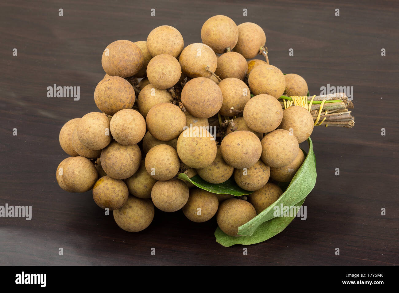 Asian fruit Longan - on wood background Stock Photo - Alamy