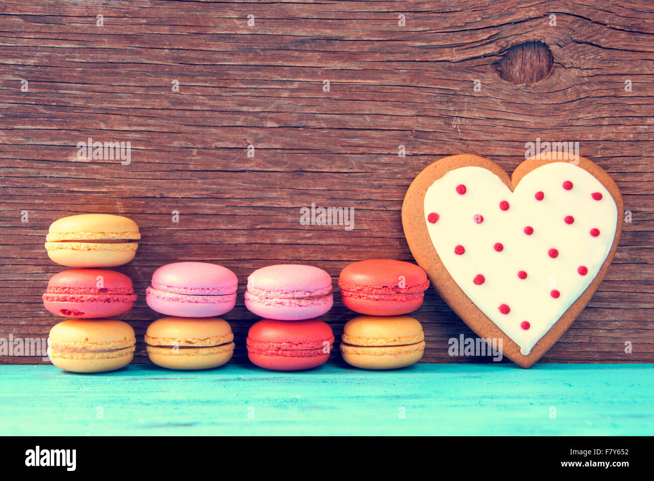 some appetizing macarons with different colors and flavors and a ...