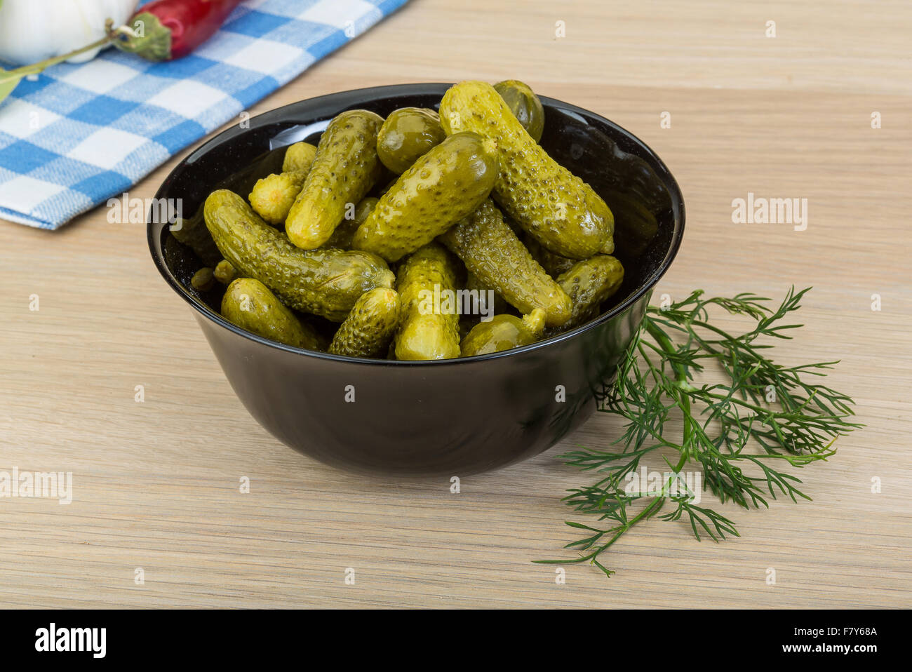 Pickled small cucumber with dill and spices Stock Photo - Alamy