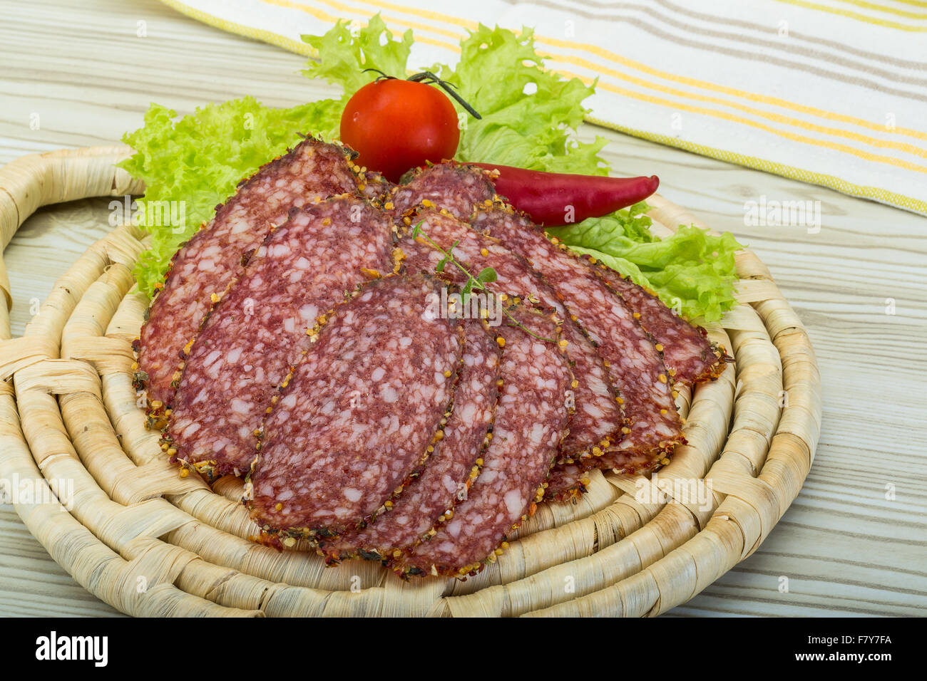 Sliced salami - with herbs and spices Stock Photo - Alamy