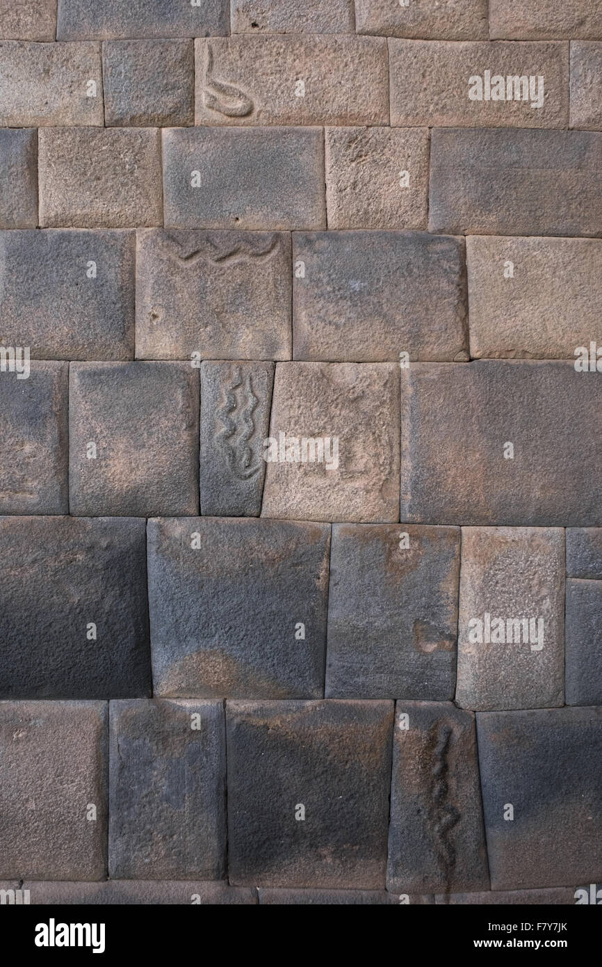 Inca wall represented seven snakes Stock Photo - Alamy