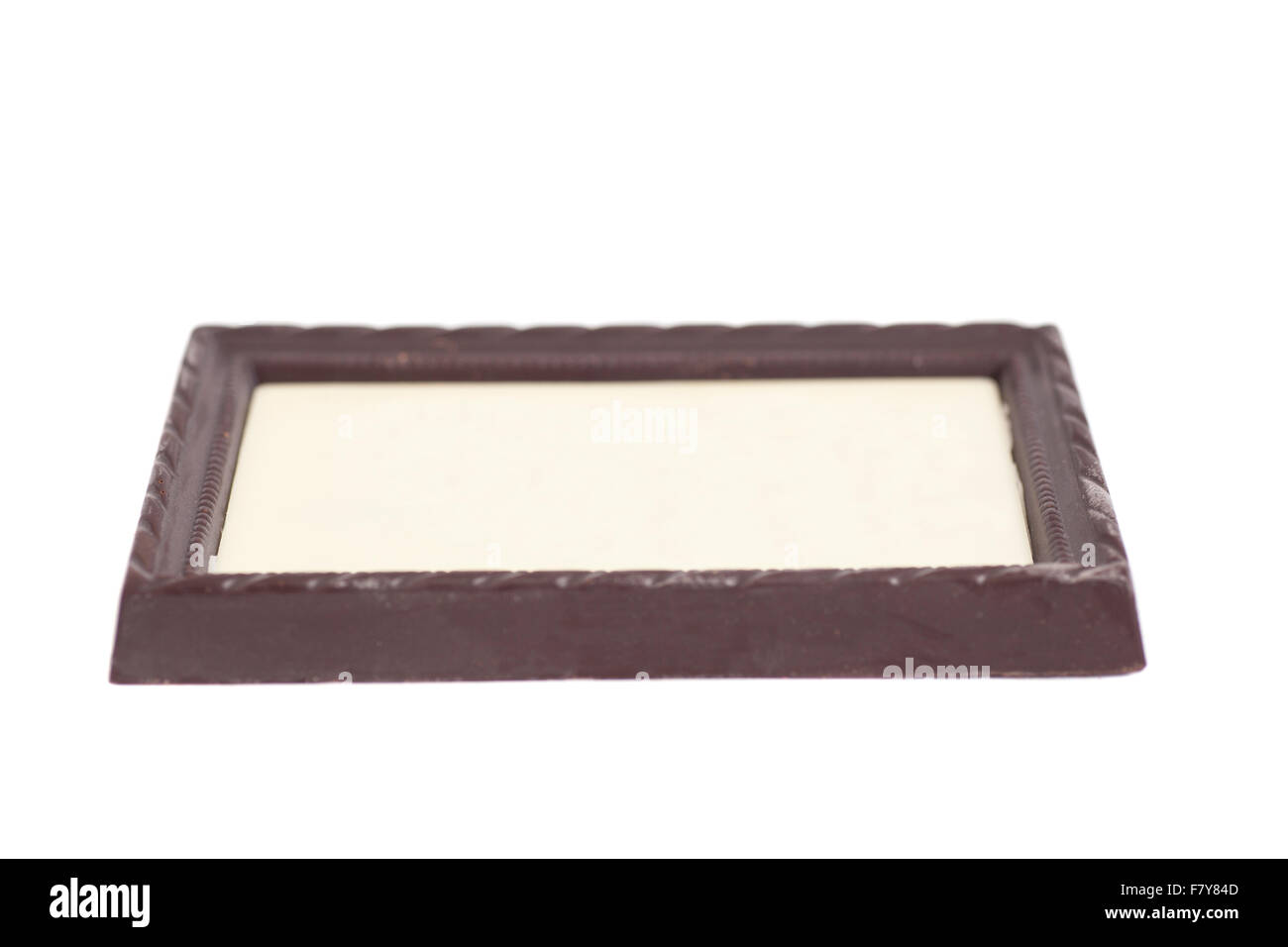 Chocolate frame isolated on white background Stock Photo - Alamy