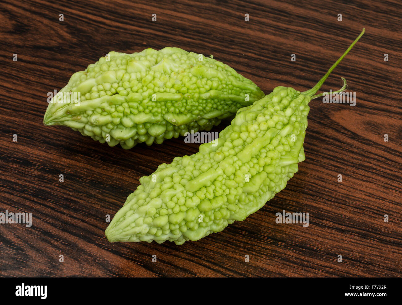 Asian vegetable - momordica on the wood background Stock Photo - Alamy