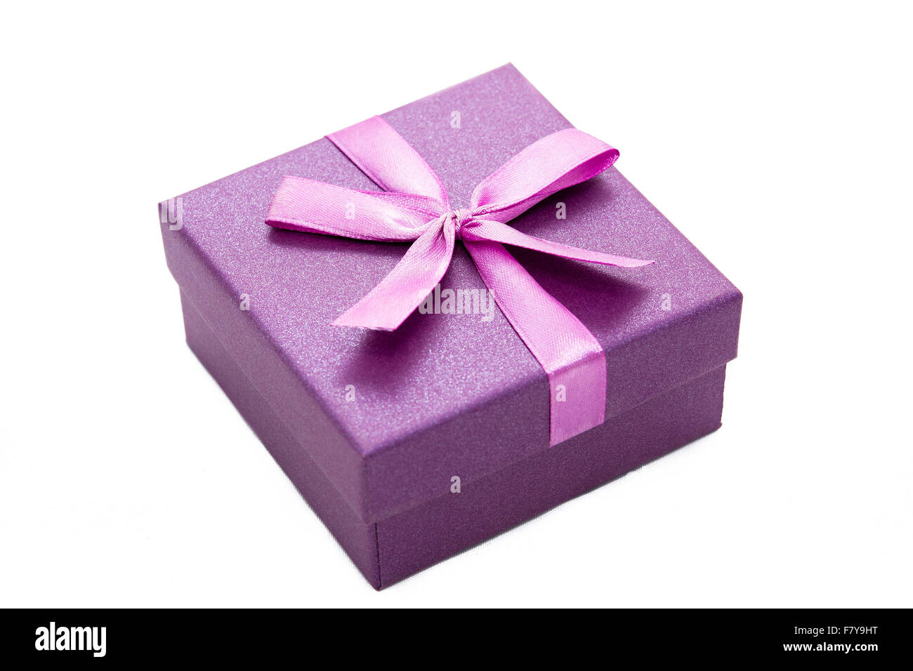 Violet gift box with ribbon isolated on white background Stock Photo ...