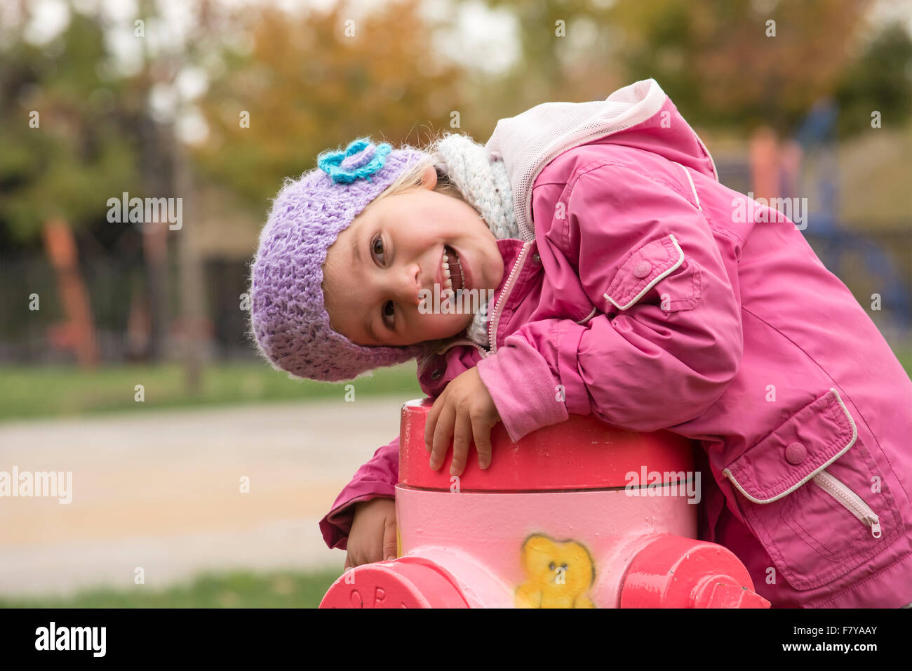 Child and the fire hydrant Stock Photo - Alamy