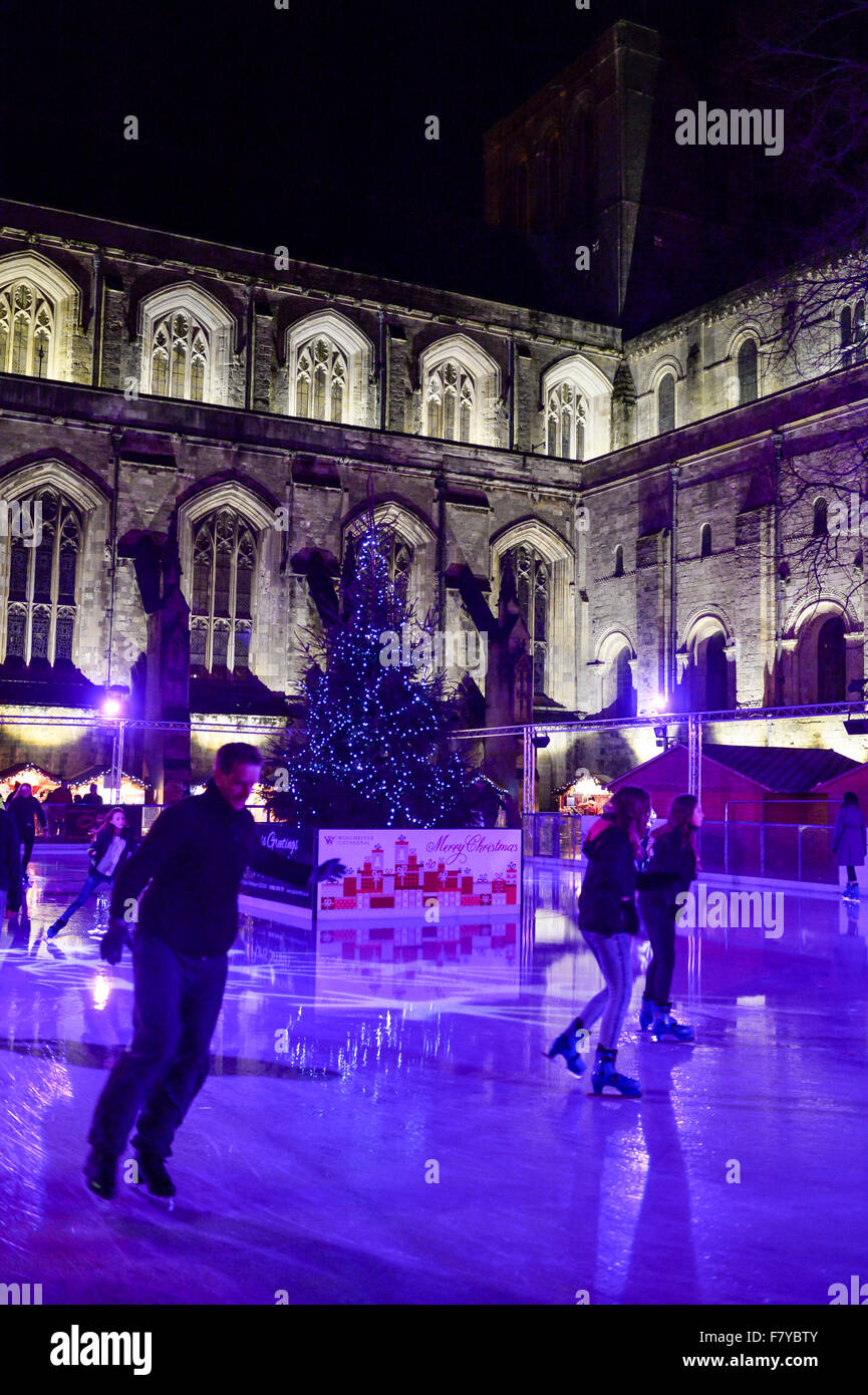 Skaters on the Ice Skating Rink in the grounds of Winchester Cathedral ...