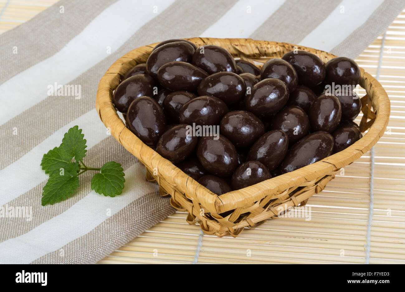 Big Almond in chocolate on the bowl Stock Photo - Alamy