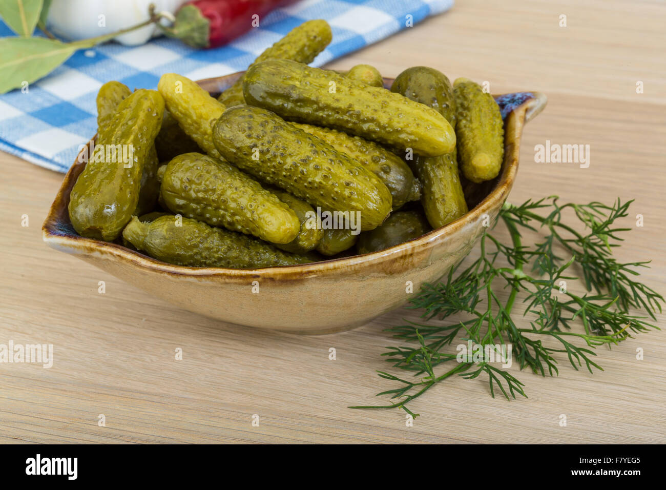 Pickled small cucumber with dill and spices Stock Photo - Alamy