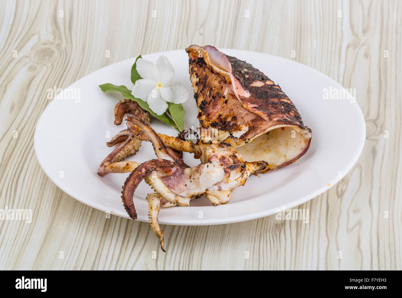 Grilled cuttlefish with spices in the bowl Stock Photo - Alamy