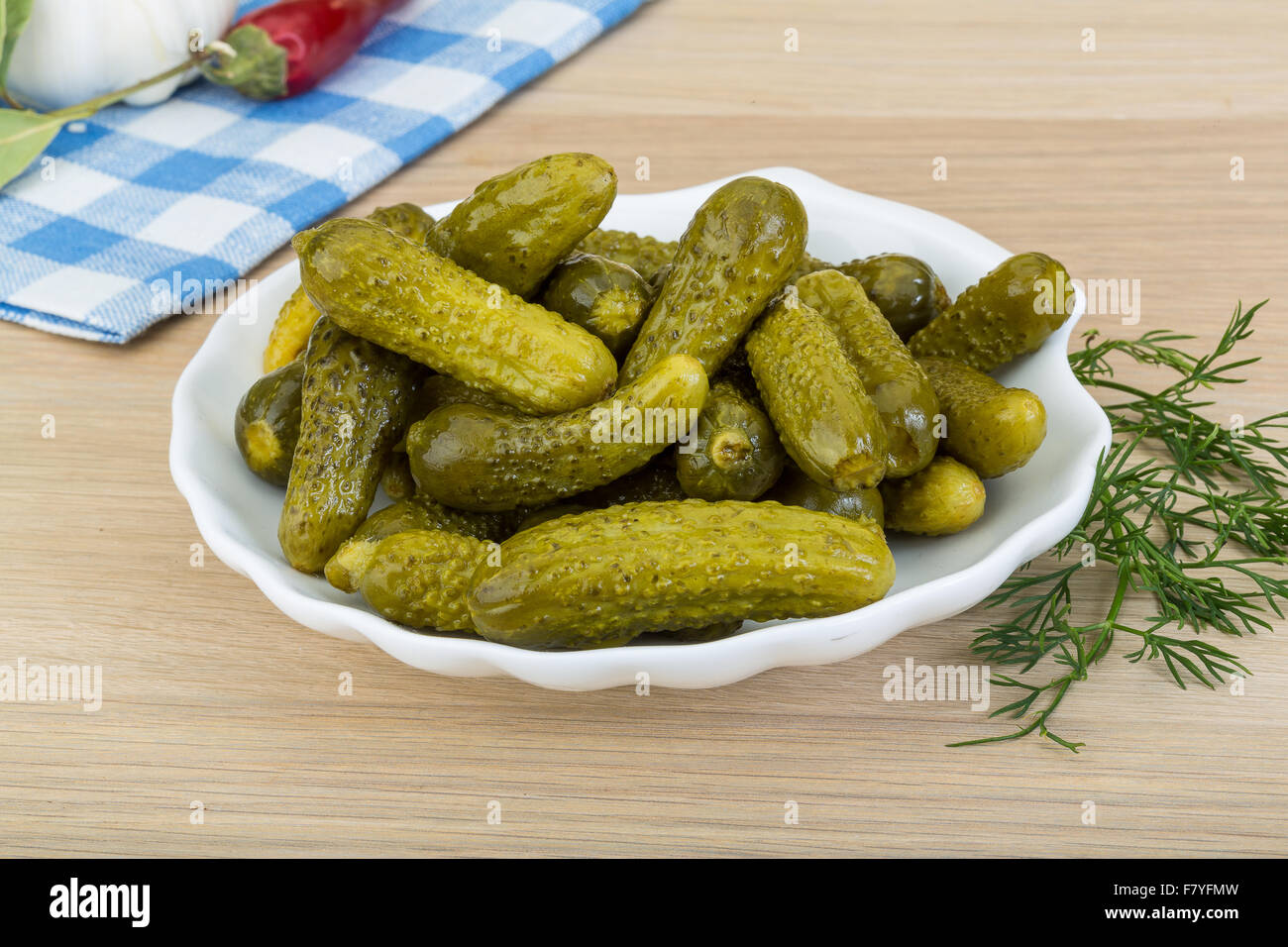 Pickled small cucumber with dill and spices Stock Photo - Alamy