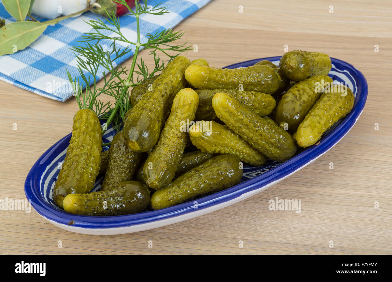 Pickled small cucumber with dill and spices Stock Photo - Alamy