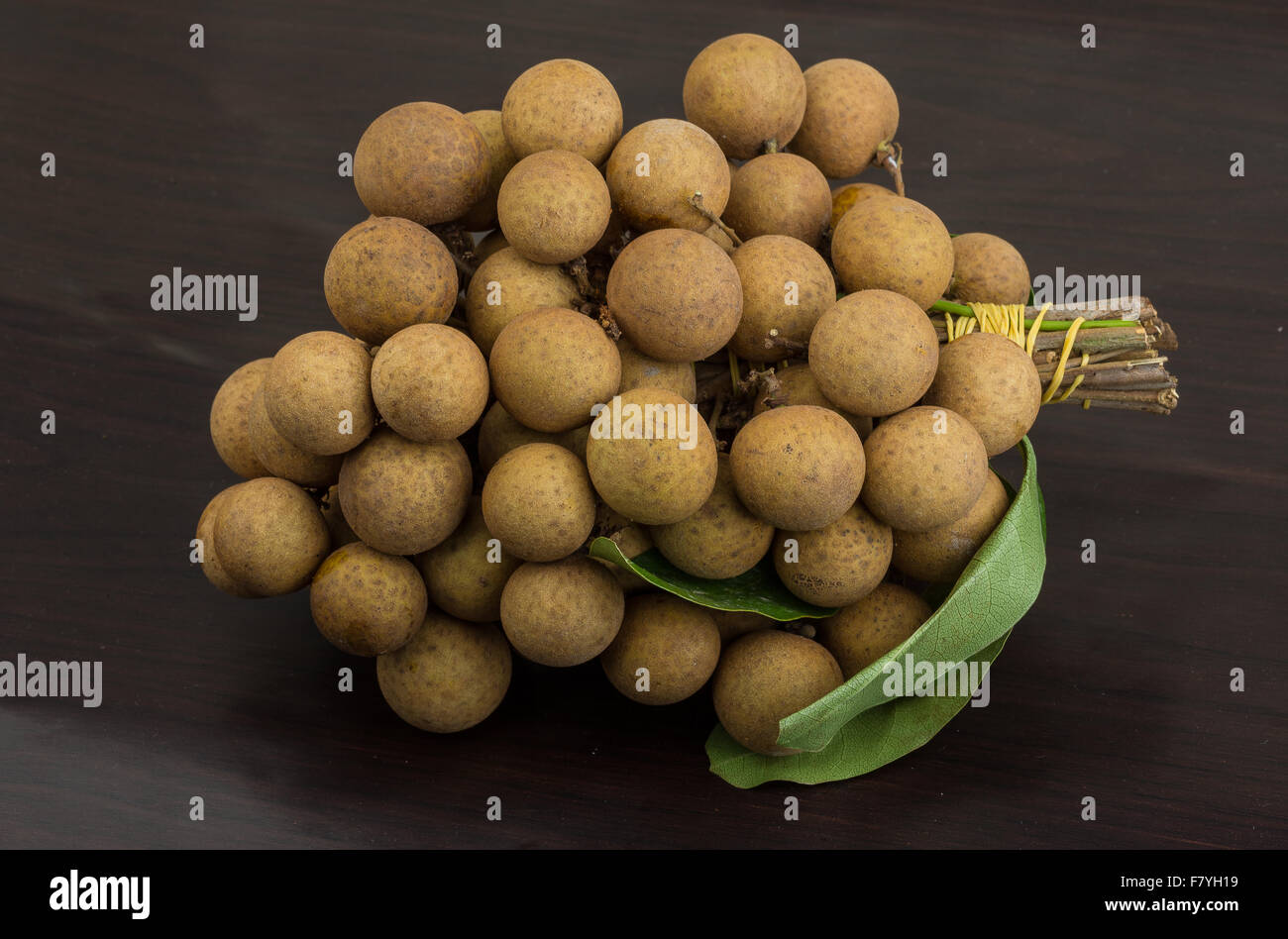 Asian fruit Longan - on wood background Stock Photo - Alamy