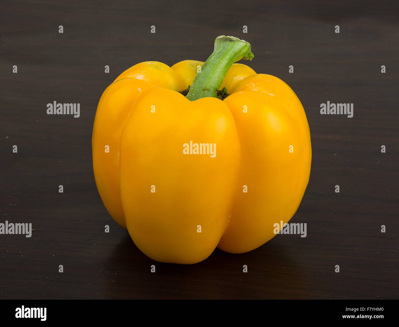 Bright fresh Yellow Bulgarian Pepper on wood background Stock Photo - Alamy