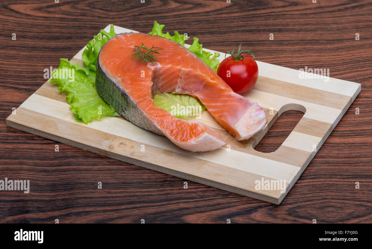 Raw salmon steak with dill ready for coocking Stock Photo - Alamy