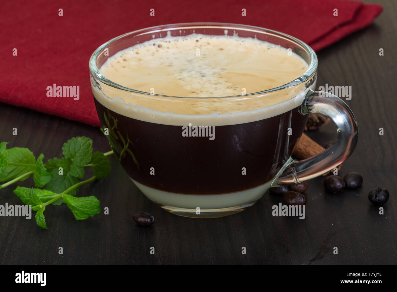 Coffee with mint leaves and cinnamon on the wood background Stock Photo ...