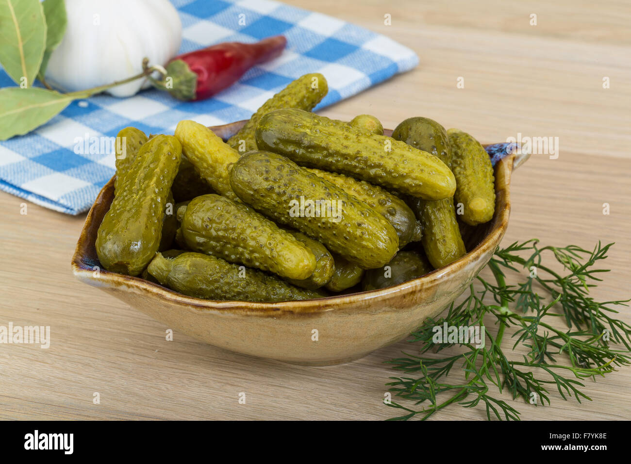 Pickled small cucumber with dill and spices Stock Photo - Alamy