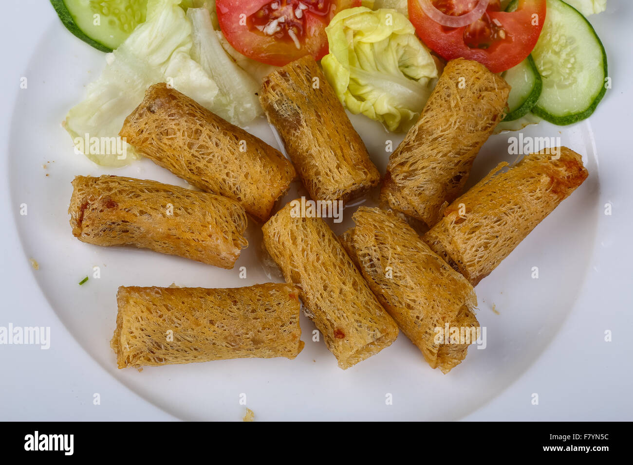 Asian traditional spring rolls on the wood background Stock Photo - Alamy