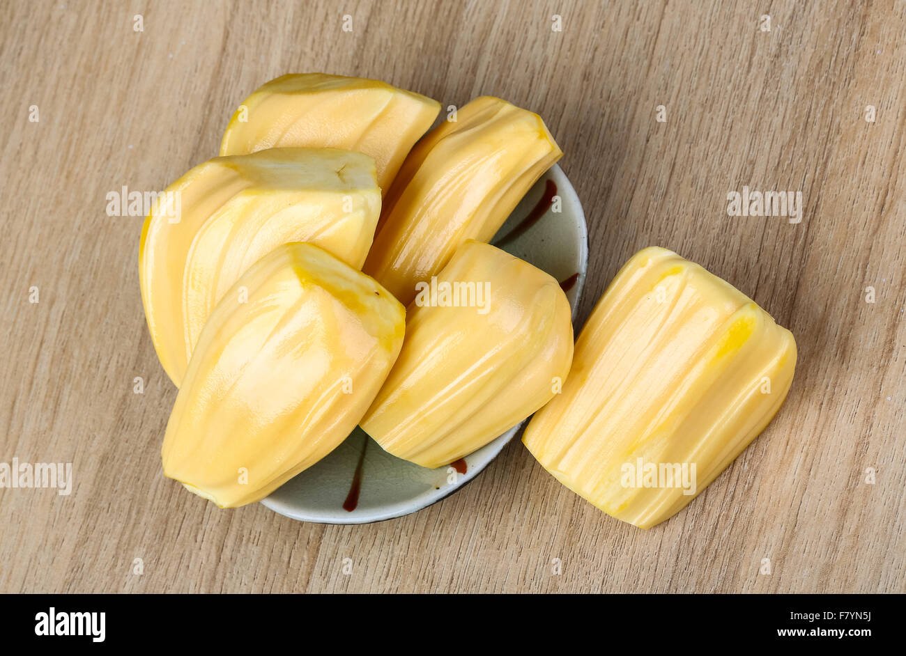 Tropical Jack Fruit on the wood background Stock Photo - Alamy