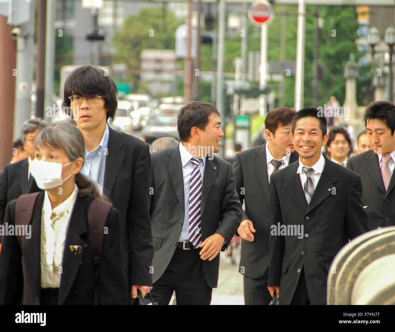 Salary men walking in Osaka, Japan Stock Photo - Alamy