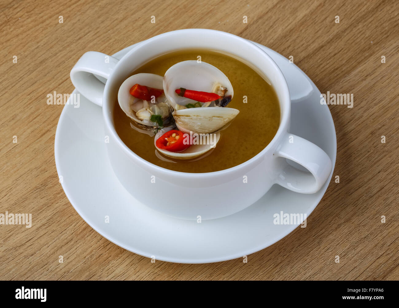 Asian traditional Shell soup on the wood background Stock Photo - Alamy
