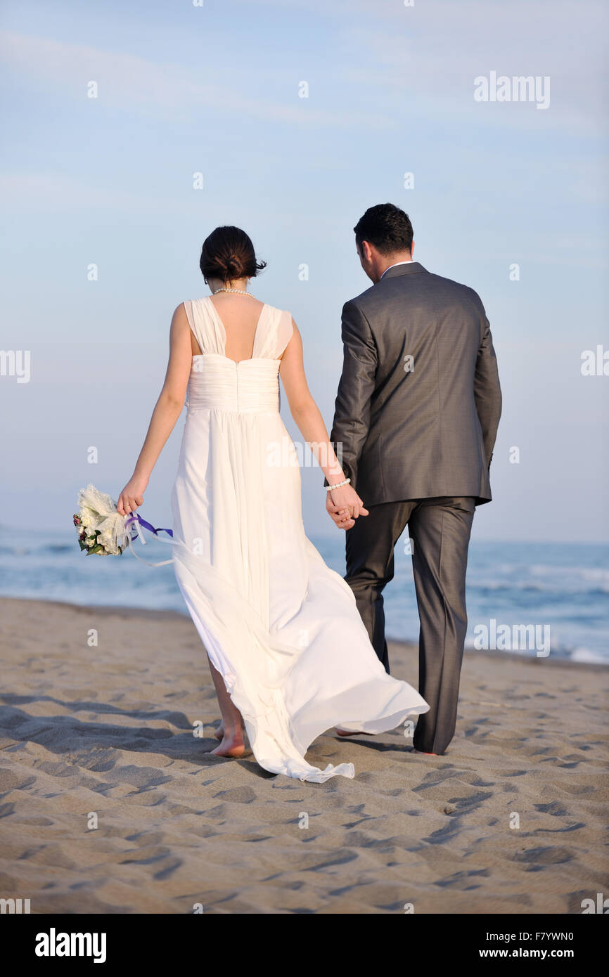 happy just married young couple celebrating and have fun at beautiful ...