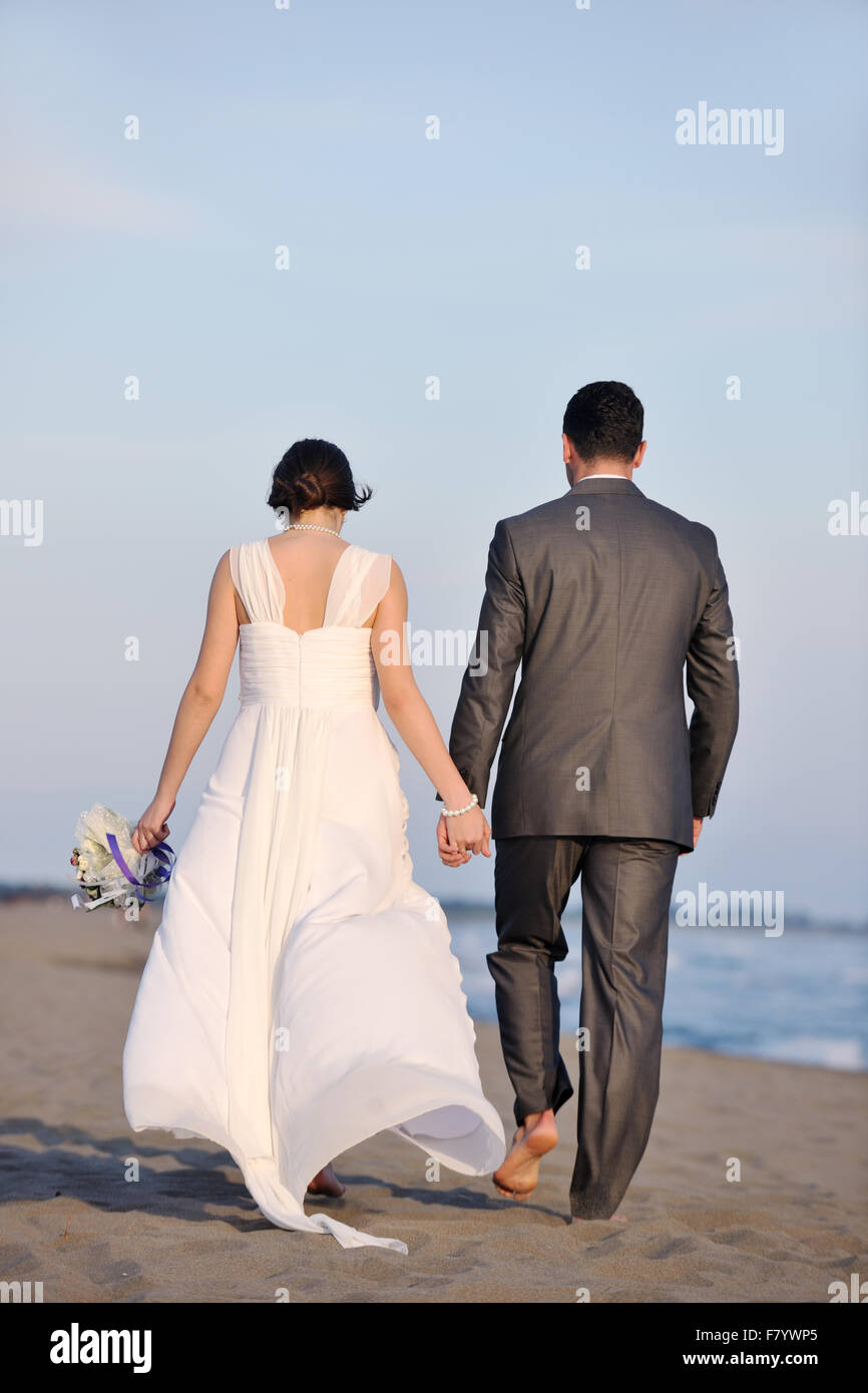 happy just married young couple celebrating and have fun at beautiful ...