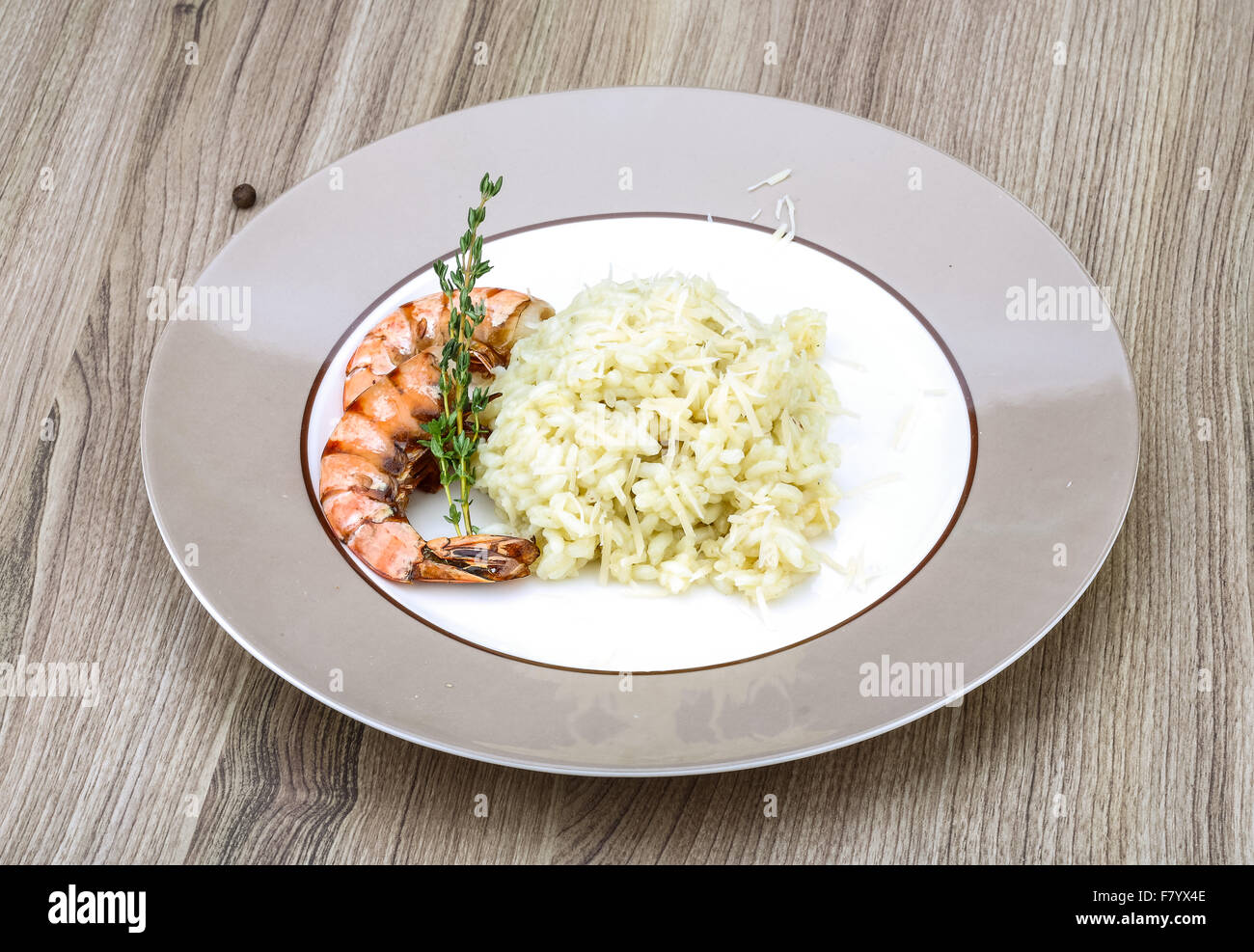 Italian trditional Risotto with tiger prawn and thyme Stock Photo - Alamy