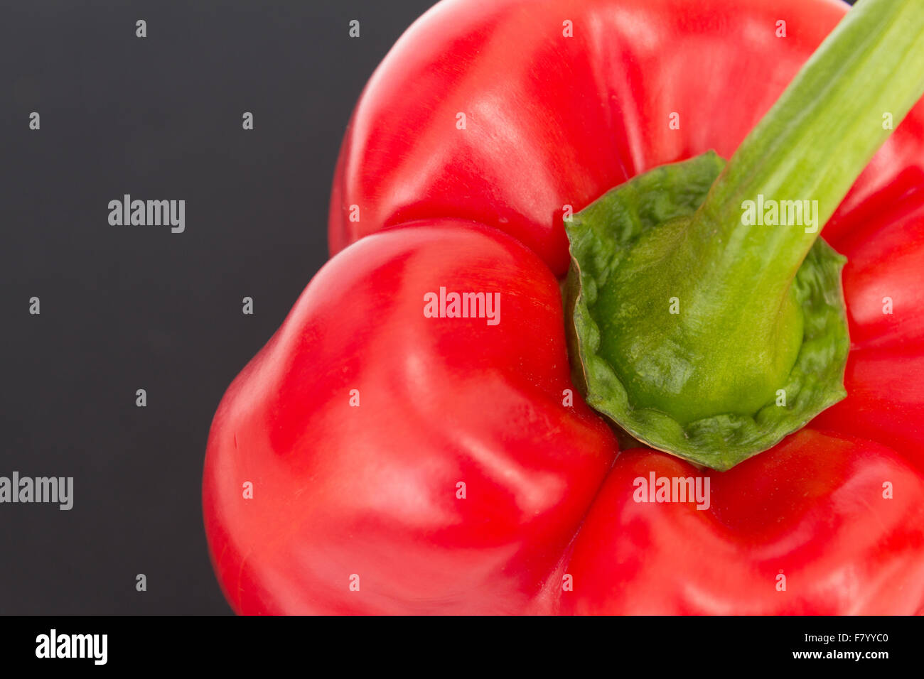 red Bell Pepper closeup /on black background - capsicum / sweet pepper ...