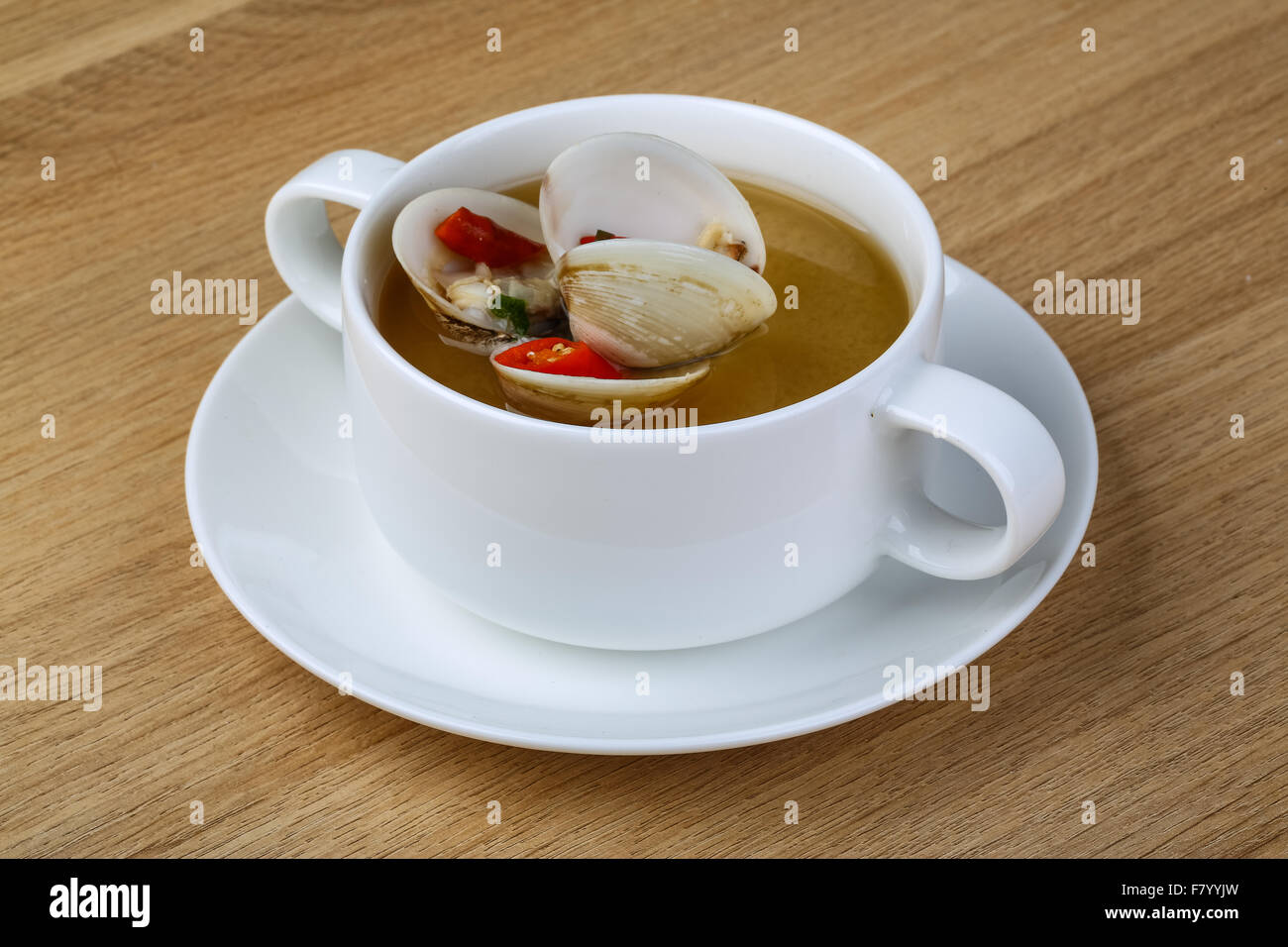 Asian traditional Shell soup on the wood background Stock Photo - Alamy
