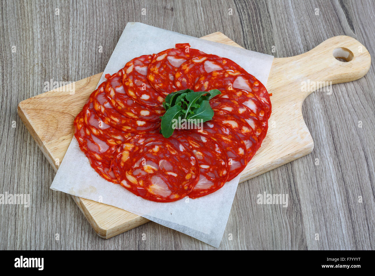 Traditional Spanish salami - Chorizo sausage on the wood background ...