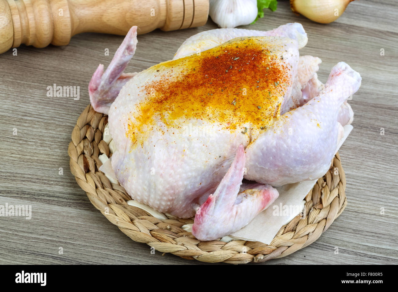 Raw chicken with spices ready for cooking Stock Photo - Alamy