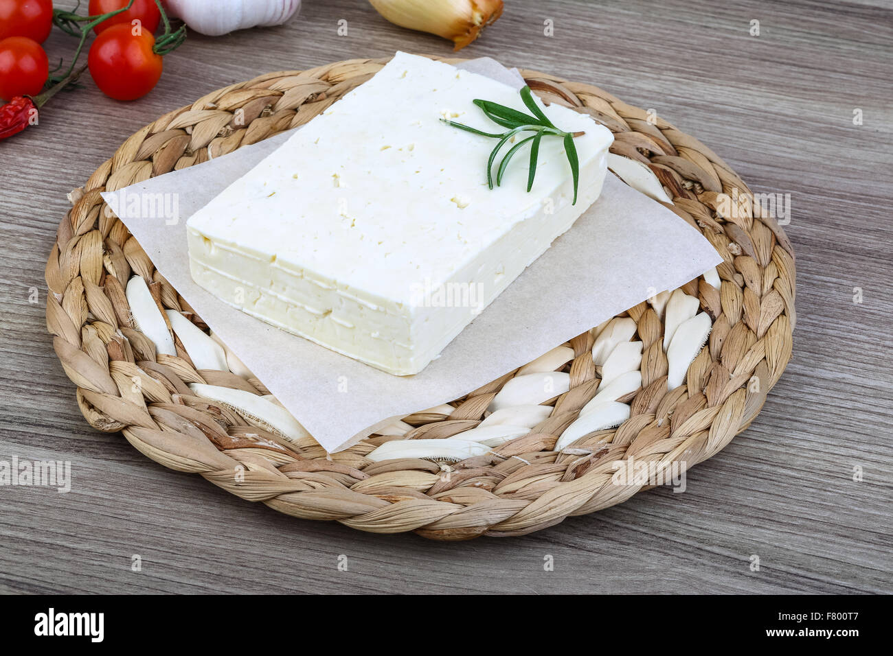 Traditional Caucasian homemade Cheese Brinza with rosemary on wood ...