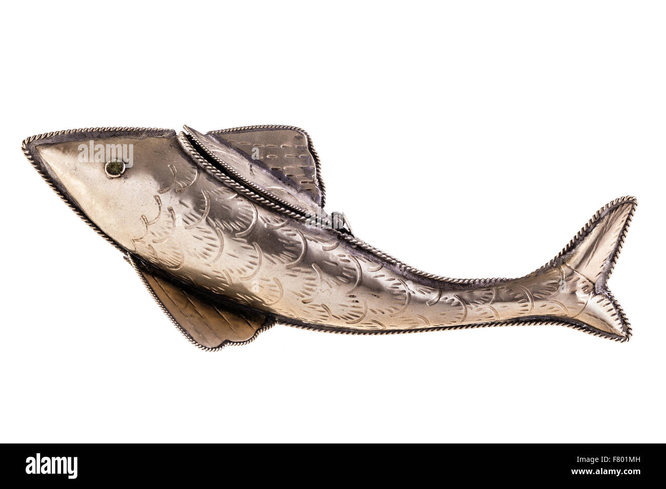 a metal fish shaped casket isolated over a white background Stock Photo ...