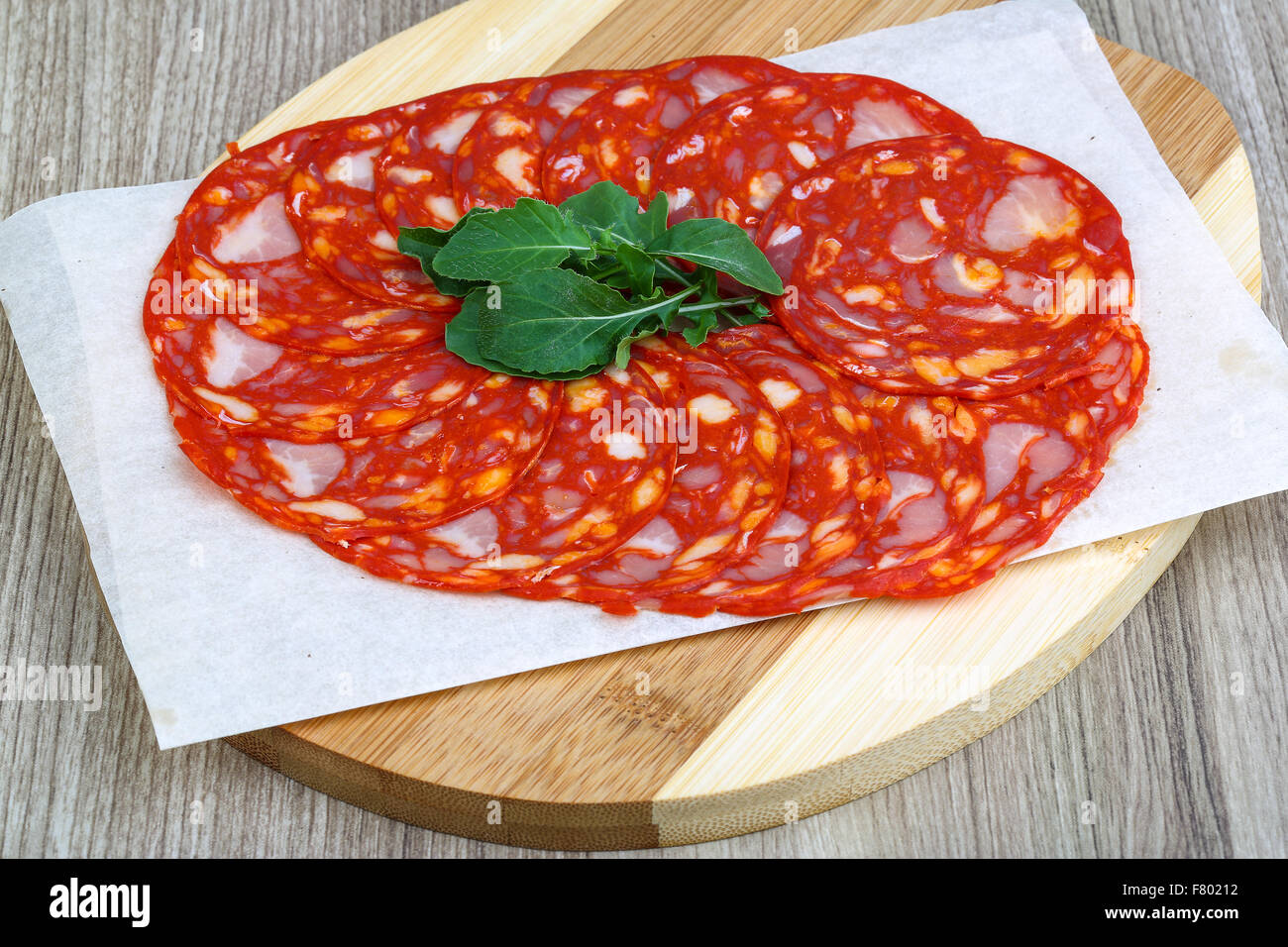 Traditional Spanish salami - Chorizo sausage on the wood background ...