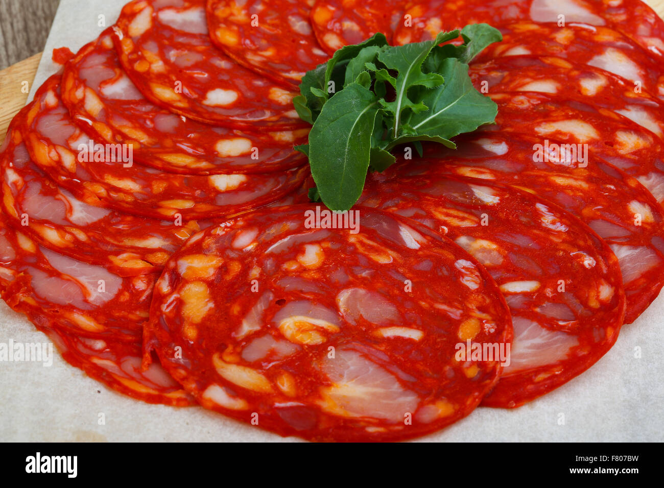 Traditional Spanish salami - Chorizo sausage on the wood background ...