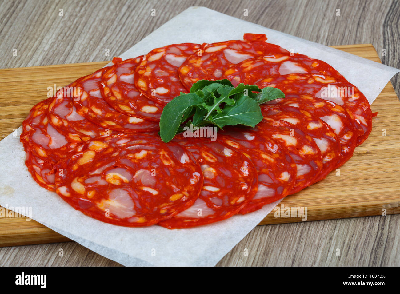 Traditional Spanish salami - Chorizo sausage on the wood background ...