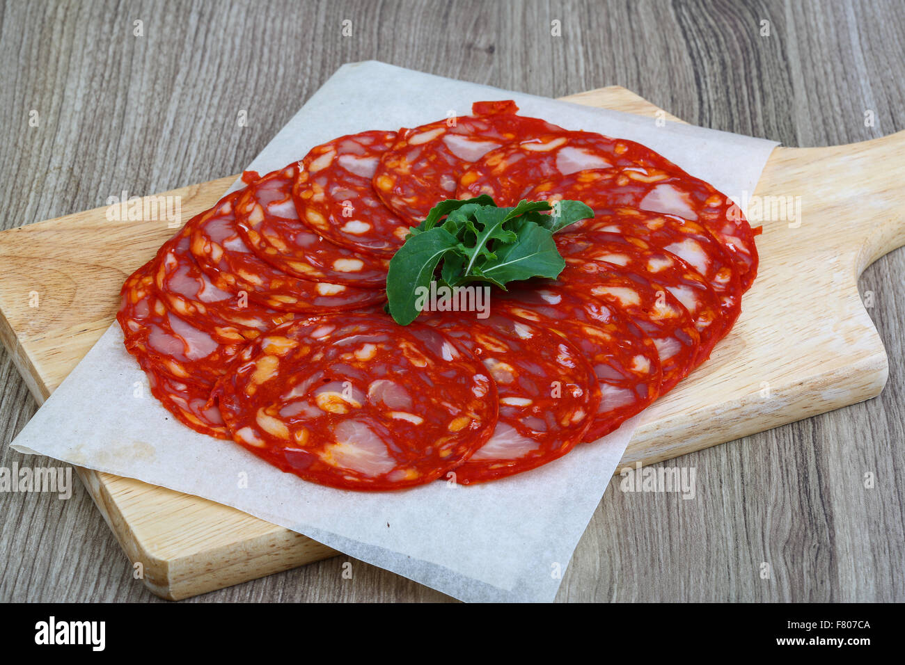 Traditional Spanish salami - Chorizo sausage on the wood background ...
