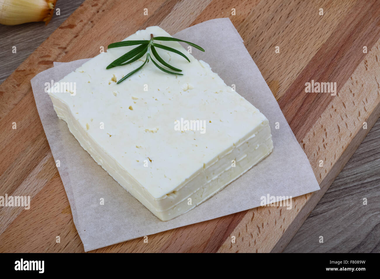 Traditional Caucasian homemade Cheese Brinza with rosemary on wood ...