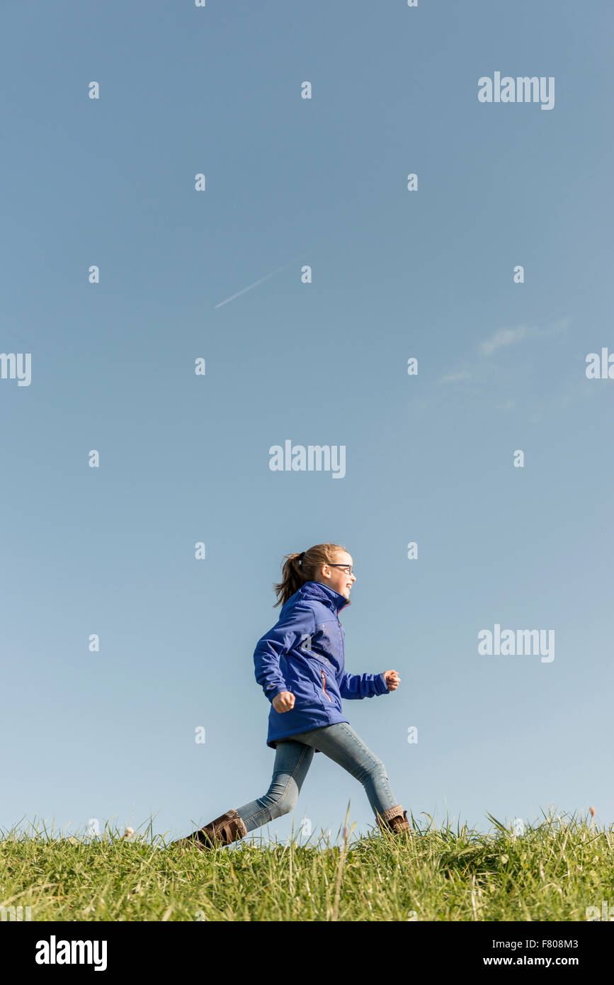 Happy children running jumping hi-res stock photography and images - Alamy