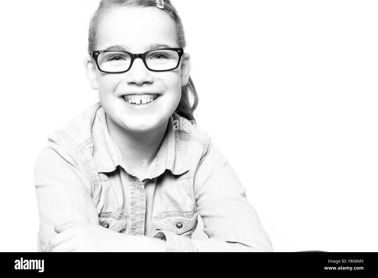 Portrait from a young girl in front of white background Stock Photo - Alamy