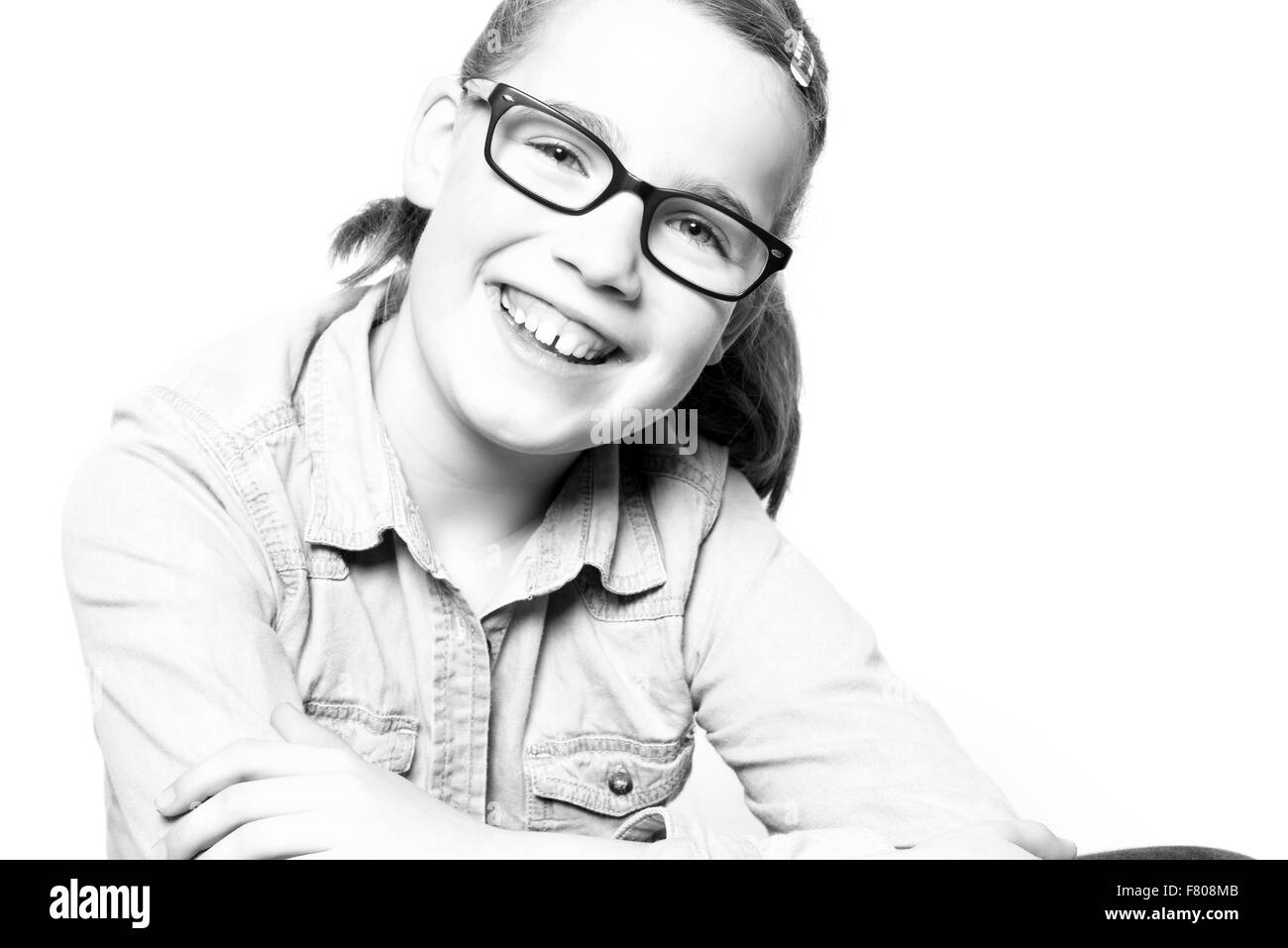 Portrait from a young girl in front of white background Stock Photo - Alamy