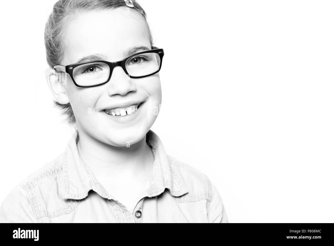 Portrait from a young girl in front of white background Stock Photo - Alamy