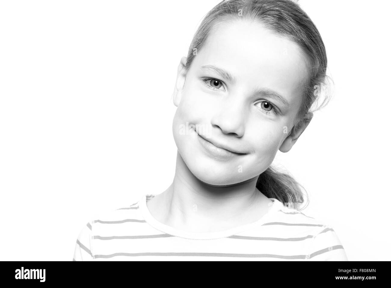 Portrait from a young girl in front of white background Stock Photo - Alamy