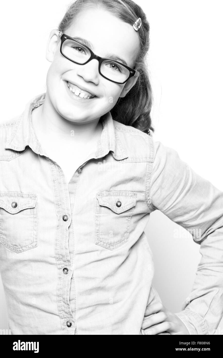 Portrait from a young girl in front of white background Stock Photo - Alamy