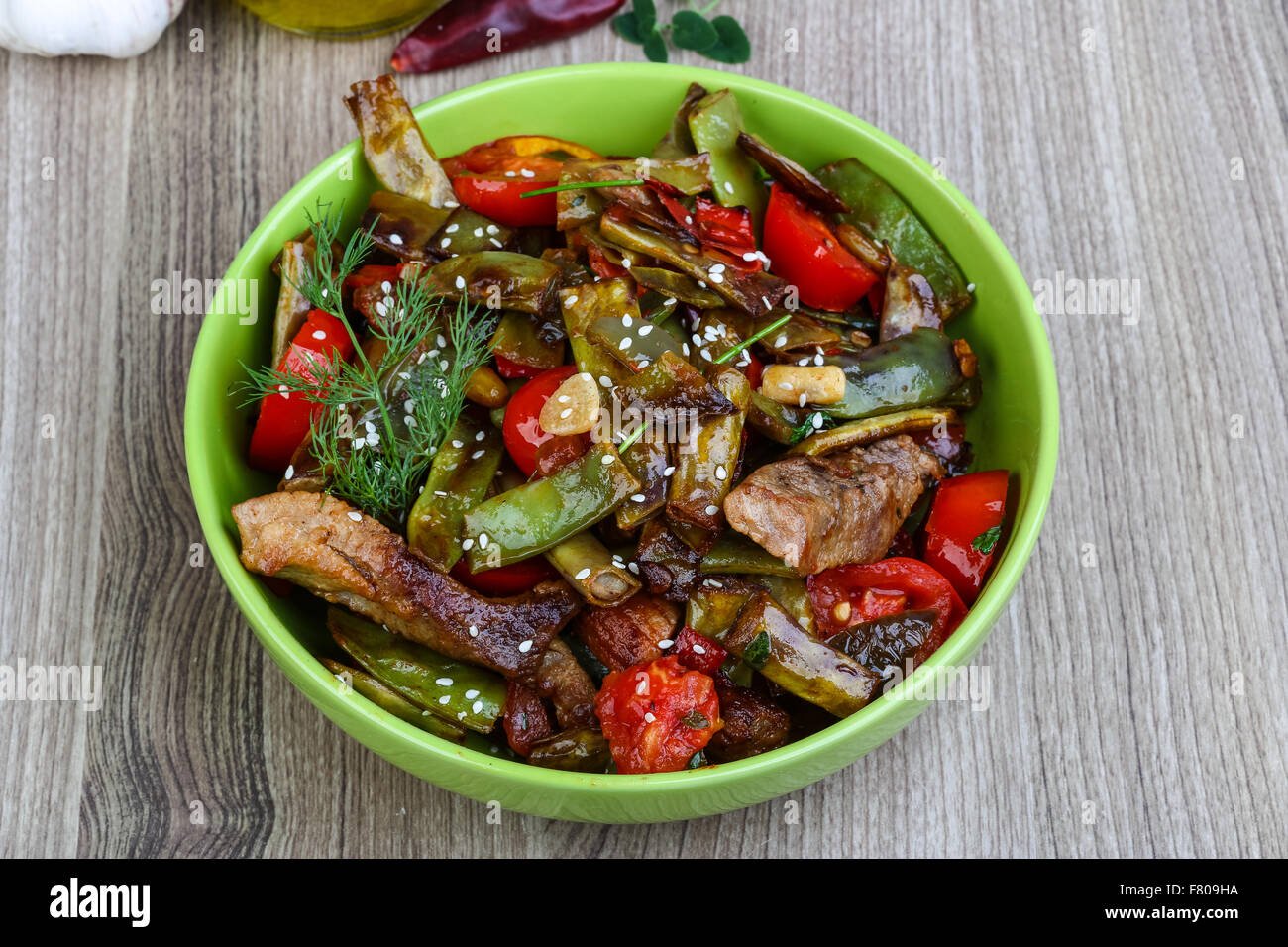 Asian cuisine - Stir fried pork with vegetables Stock Photo - Alamy