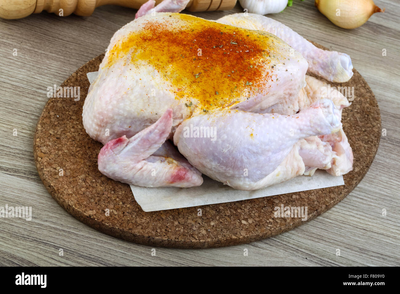 Raw chicken with spices ready for cooking Stock Photo - Alamy